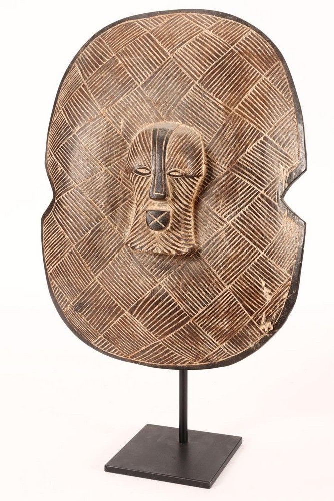 Cameroon Carved Wooden Shield with Central Face and Geometric Motifs ...