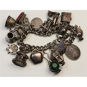 Charming Silver Bracelet with 18 Assorted Charms - Bracelets/Bangles ...