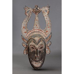 New Guinea tribal artefacts, masks and helmets - price guide and values