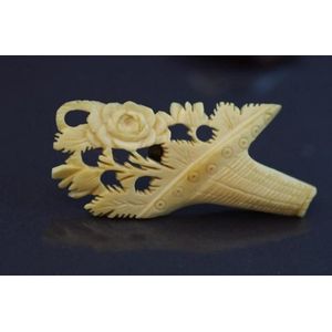 Antique and vintage carved ivory brooches - price guide and values