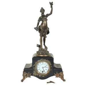 Antique figural clock - price guide and values