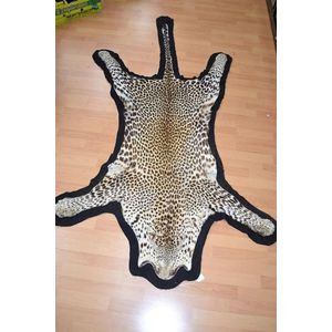 Vintage leopard, cheetah and jaguar skin rugs - price guide and values