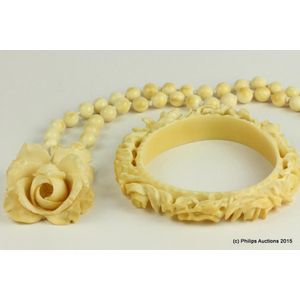Vinatge carved ivory pendants and lockets - price guide and values