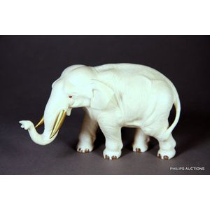 Carved Ivory Elephant with Ruby Eyes and Gilded Accents - Ivory - Oriental
