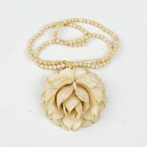 Vinatge carved ivory pendants and lockets - price guide and values