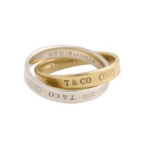 Tiffany & Co. '1837' Interlocking Gold and Silver Ring - Rings - Jewellery