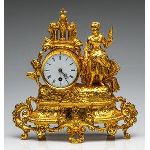 Antique figural clock - price guide and values