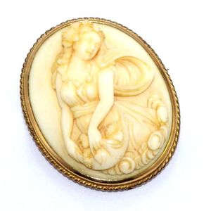 Antique and vintage carved ivory brooches - price guide and values