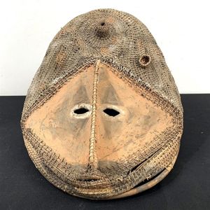 New Guinea tribal artefacts, masks and helmets - price guide and values