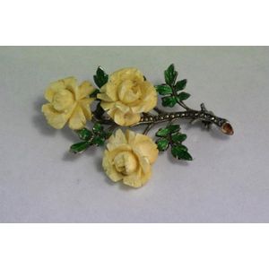 Antique and vintage carved ivory brooches - price guide and values