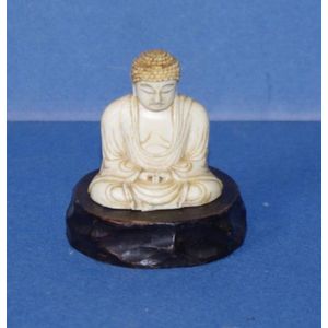 Carved ivory Oriental Buddha - price guide and values