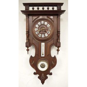 European antique wall clock with thermometer, barometer, key, pendulum ...