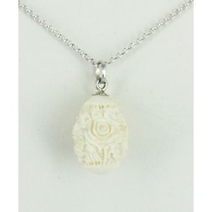 Vinatge carved ivory pendants and lockets - price guide and values