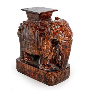 A Chinese brown-glazed ceramic elephant stool. Provenance: The ...