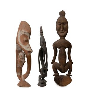 New Guinea tribal artefacts, carved figures - price guide and values