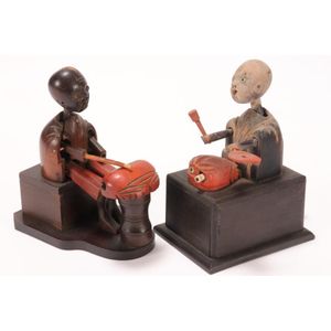 Japanese Kobe automaton toys: Seated figures hitting objects ...