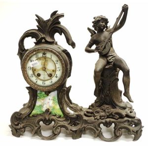 Antique figural clock - price guide and values