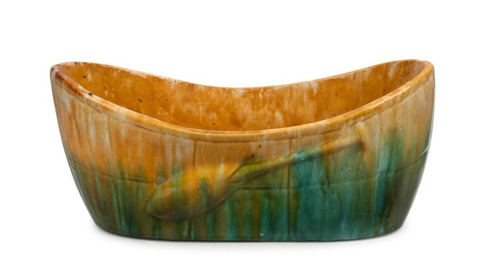 Green glazed pottery canoe vase with paddle decoration by John Campbell ...