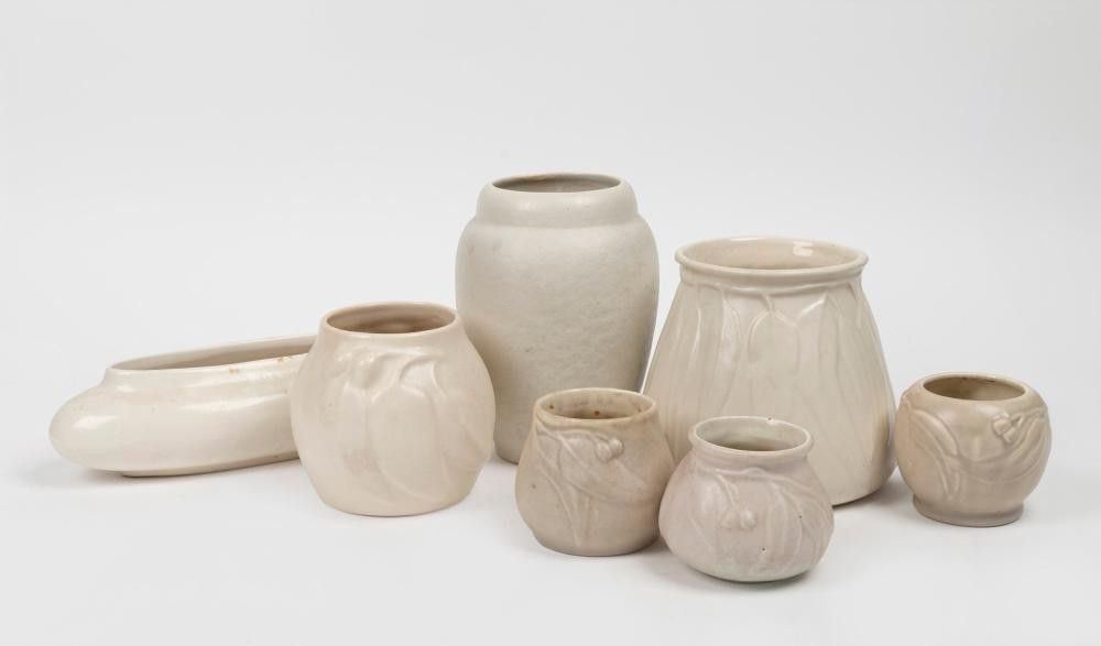 Group of Seven Cream Glazed Pottery Vases with Gumnut Decoration ...