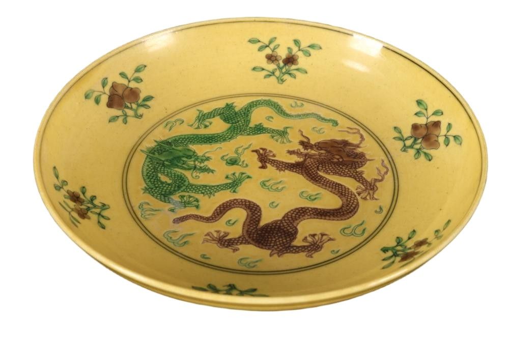 Yellow Chinese porcelain dish with dragon and floral decoration ...