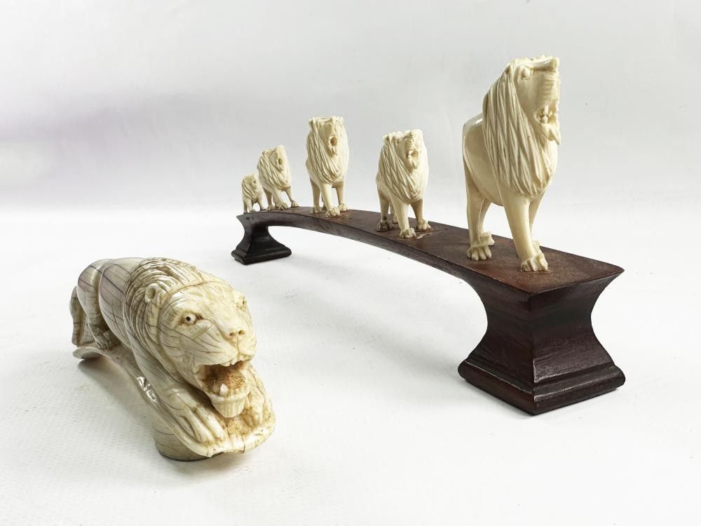 African Carved Ivory Lion Set on Hardwood Stand - African - Tribal