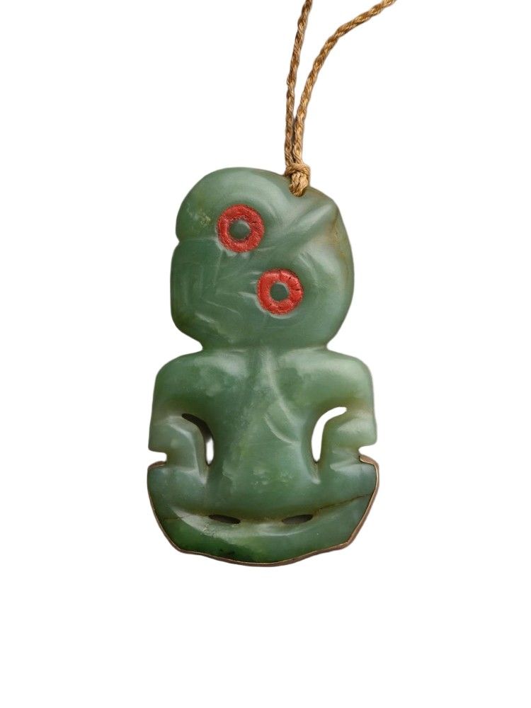 Gold-backed Maori hei tiki with bone toggle, 19th century - New Zealand ...
