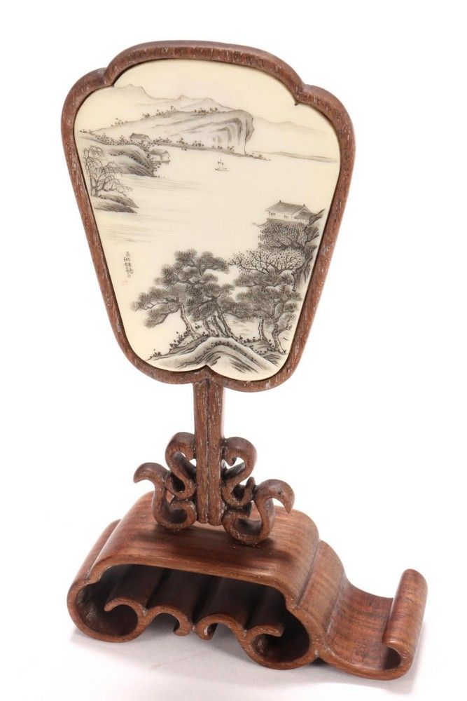 Chinese carved ivory panel with mountainous landscape on wooden stand ...