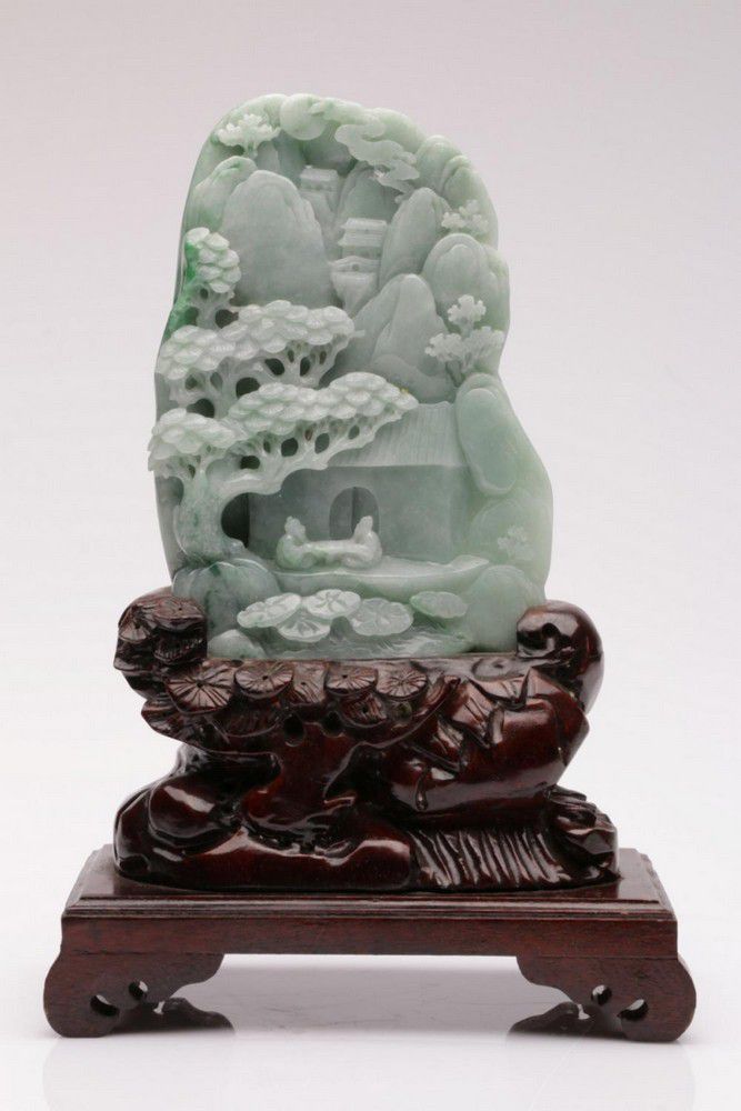 A Chinese carved greenstone piece featuring village scene on… - Zother ...