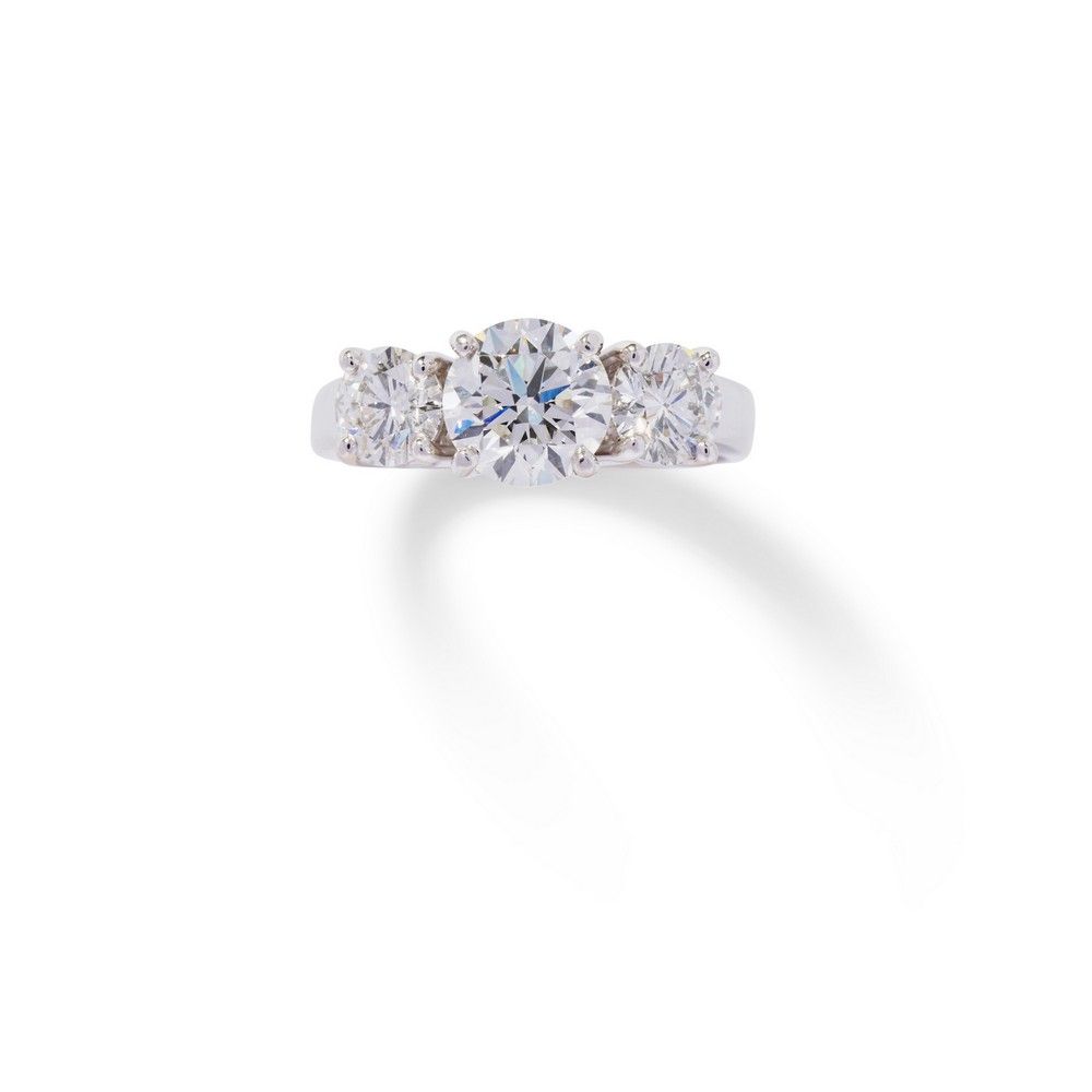 1. "Three Stone Diamond Ring with 1.51 Carat Center Stone" - Rings ...