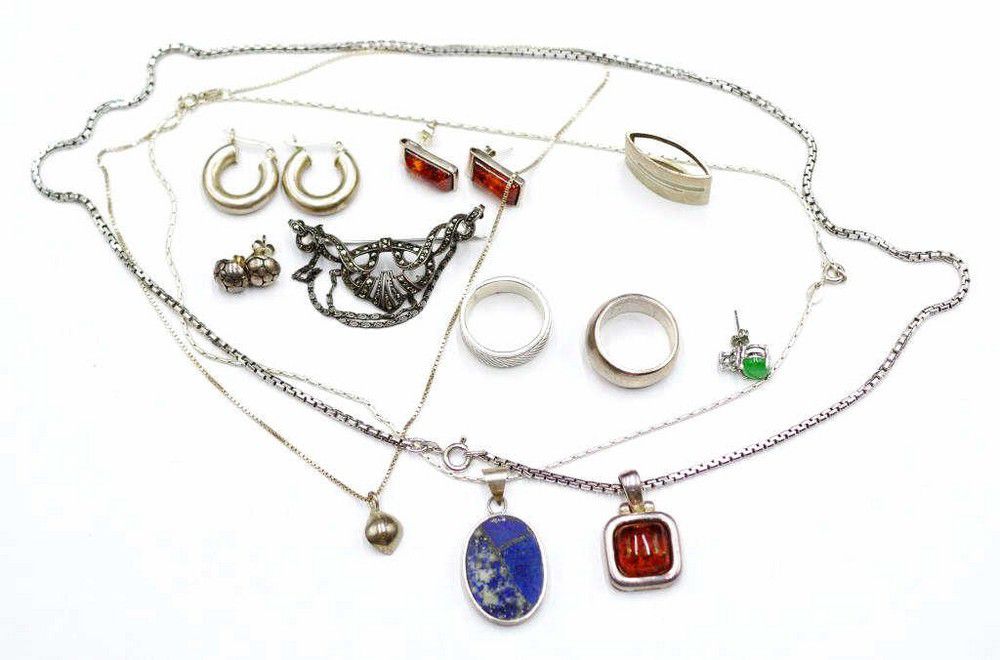 Silver Jewelry Set with Rings, Pendants, Earrings, and Brooch ...