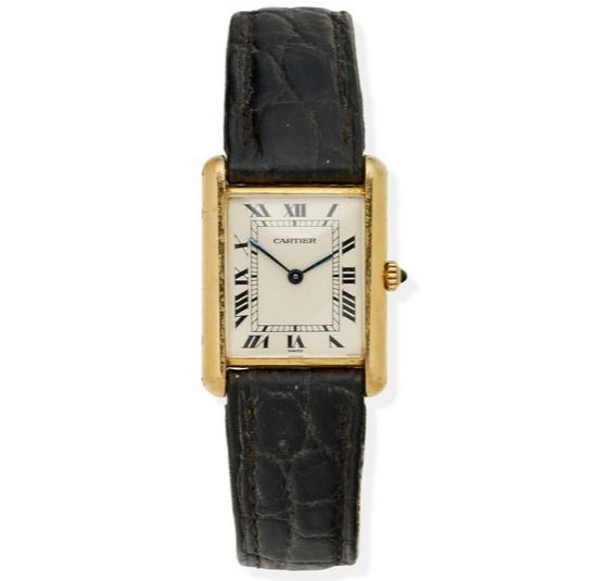 Cartier . 18ct gold tank wristwatch, the rectangular dial with ...
