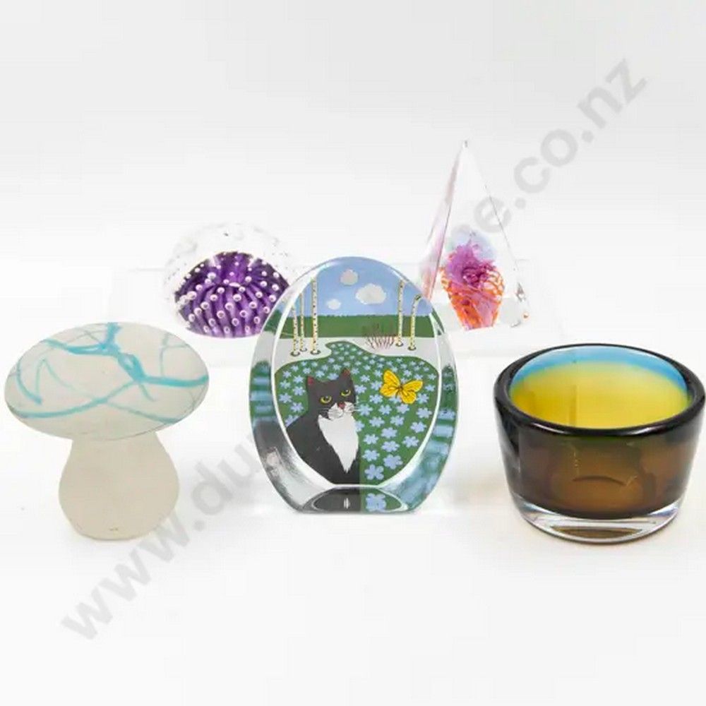 Iittala Finland and Kosta Boda paperweights with three others ...