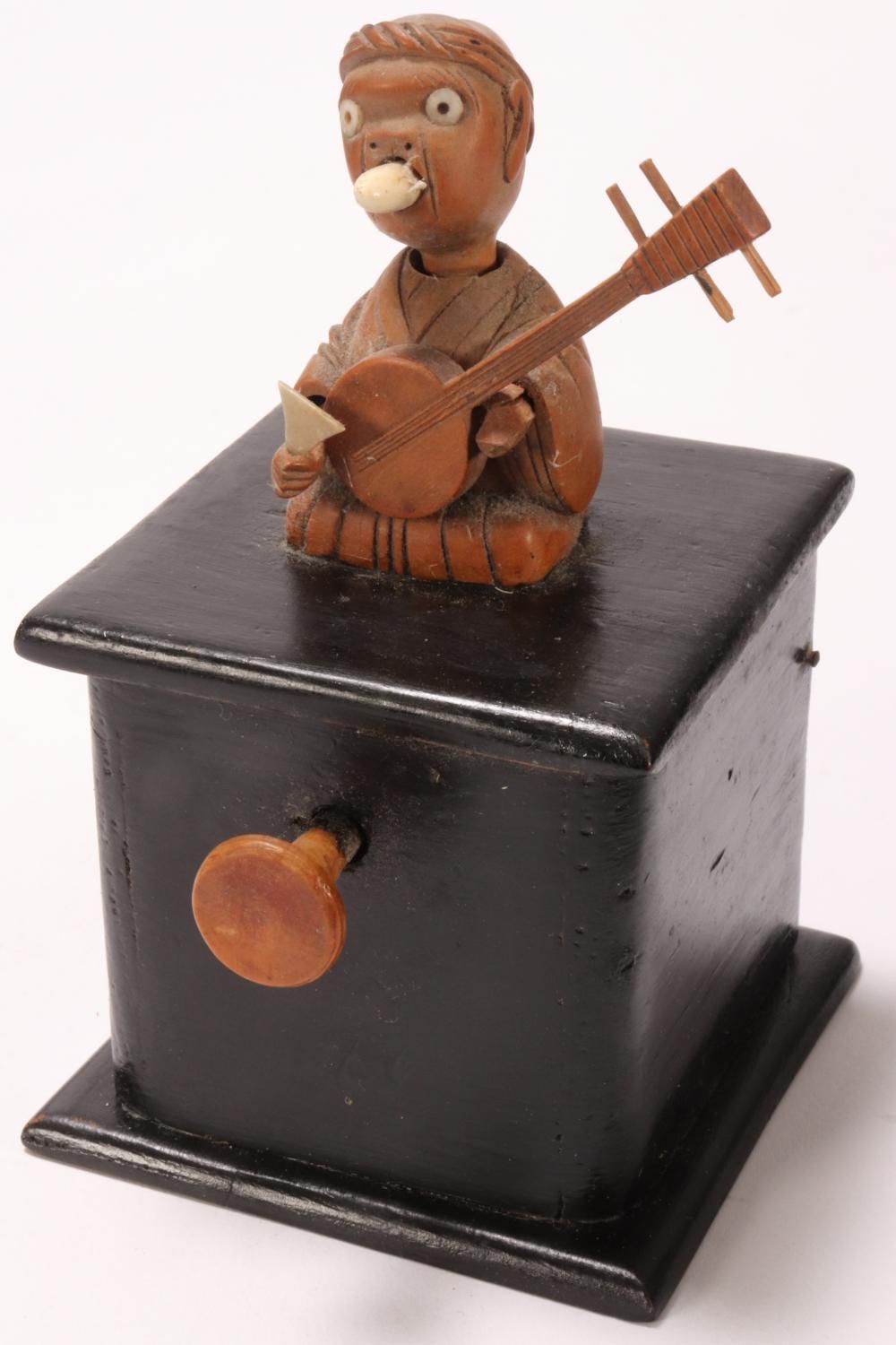 Meiji Kobe automaton toy: Seated musician playing lute, boxwood ...