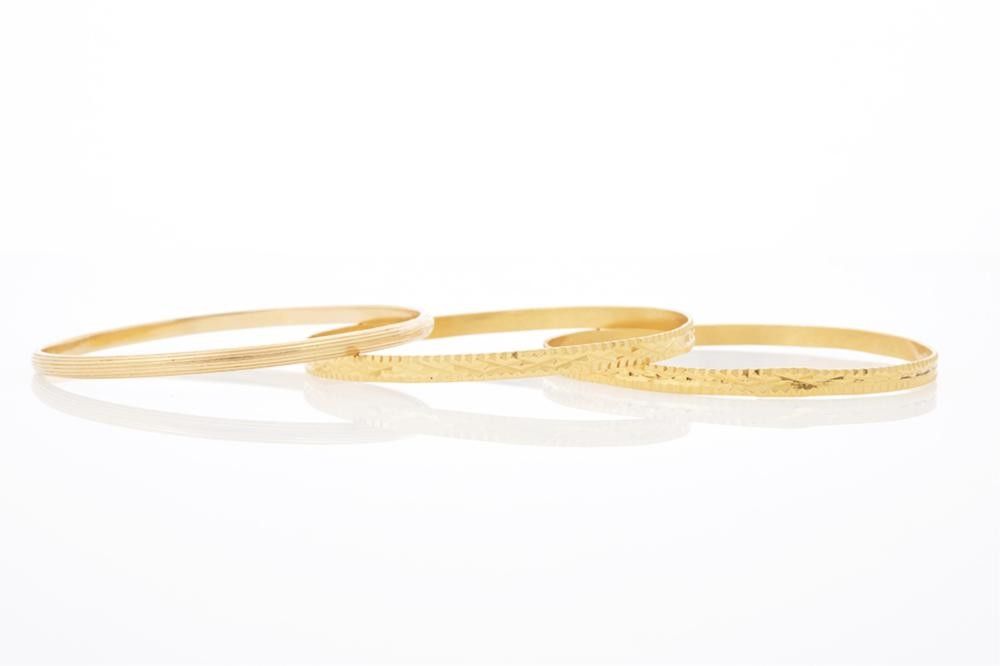 Three 88% Yellow Gold Bangles and 18ct Rose Bangle - Bracelets/Bangles ...